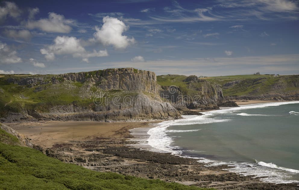 Mewslade Bay, Gower Peninsula Stock Photo - Image of clouds, coastline ...