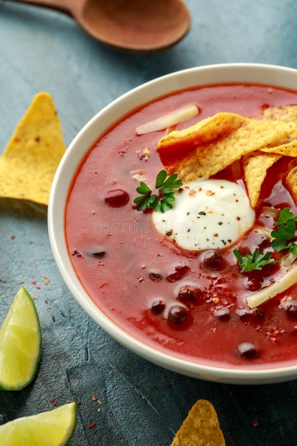 Mexican Chilli Bean Soup with Yogurt, Cheese, Lime and Tortilla Chips ...