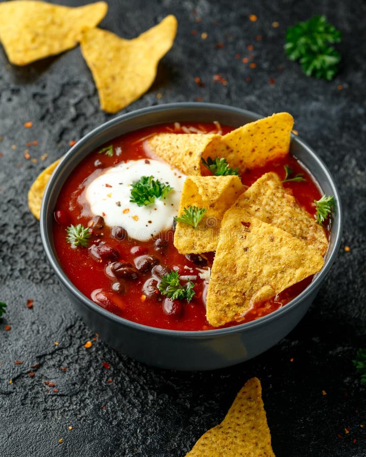 Mexican Chilli Bean Soup with Yogurt, Cheese and Tortilla Chips in ...