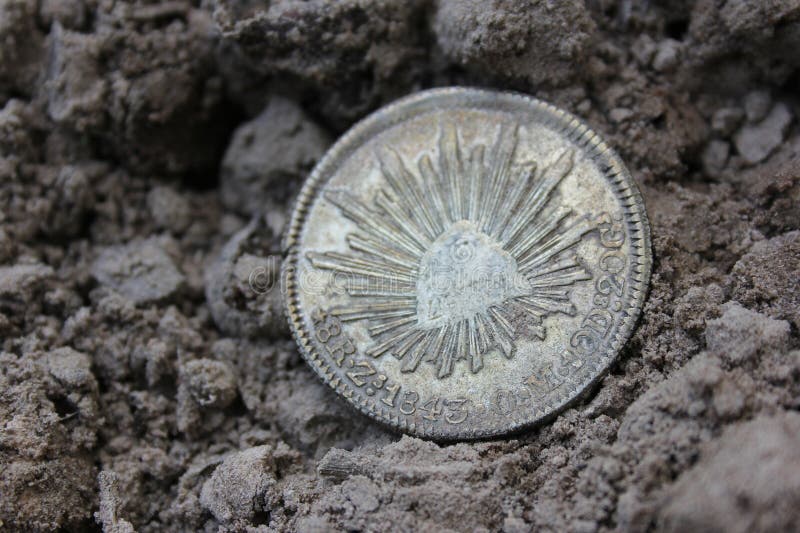 1843 Mexican Libertad Silver Coin on Ground in Dirt Front View Stock ...