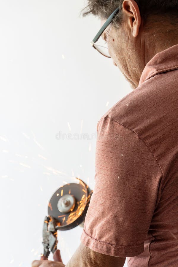 Mexican Man Using an Angle Grinder Stock Photo - Image of engineering ...