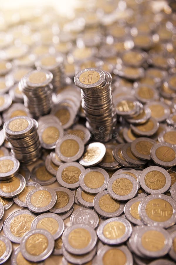 Mexican peso coins stock image. Image of metal, bank - 97854737