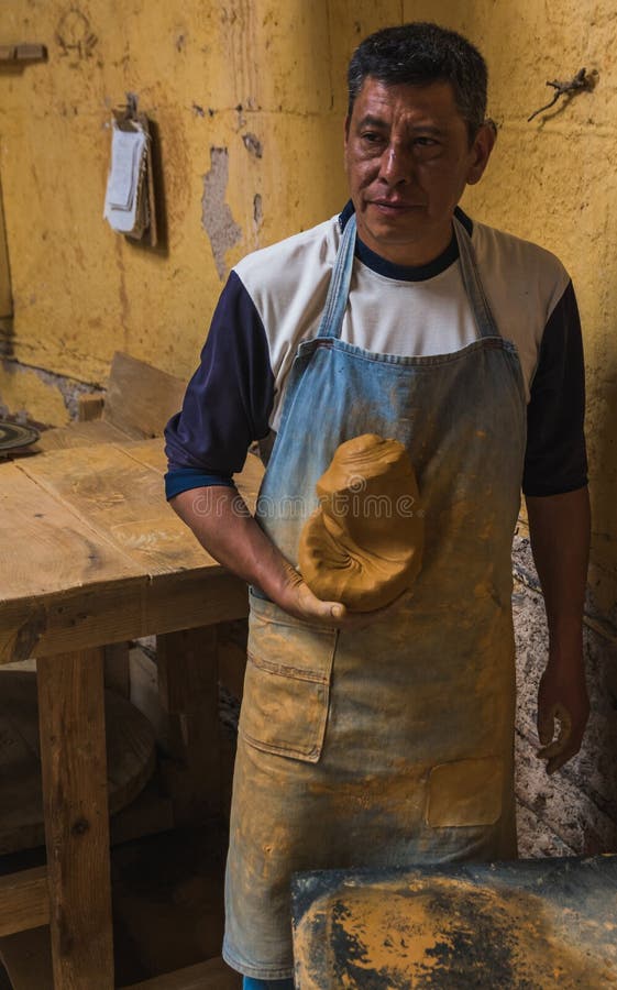 Mexican Potter Craftsman, Working the Clay with His Hands Editorial ...