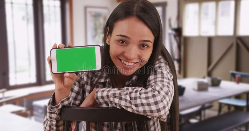 Mexican Woman Student Holding Smartphone with Green Screen Stock Image ...
