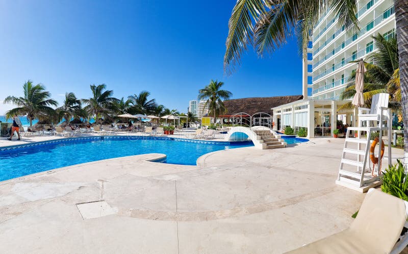 Mexico, Cancun, Swimming Pool on the Beach with Bridge Editorial ...