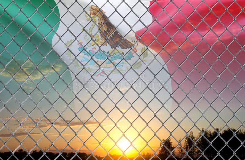 Mexico Flag Behind Chain Link Fence Against the Sunset Stock ...