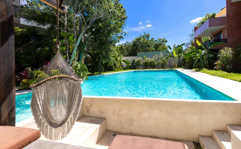 Mexico, Tulum Upscale Hotel Patio with Jungle Views and Hammock Stock ...