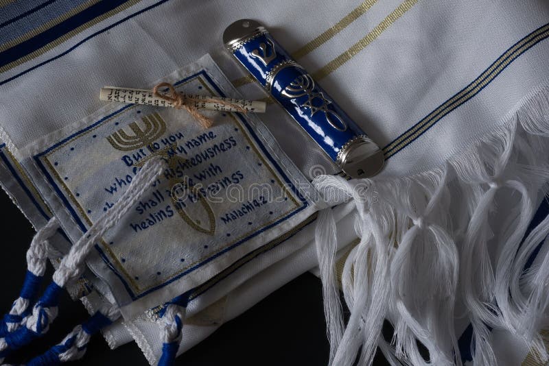 Mezuzah Scrolls on a Beautiful White Tallit Stock Photo - Image of ...