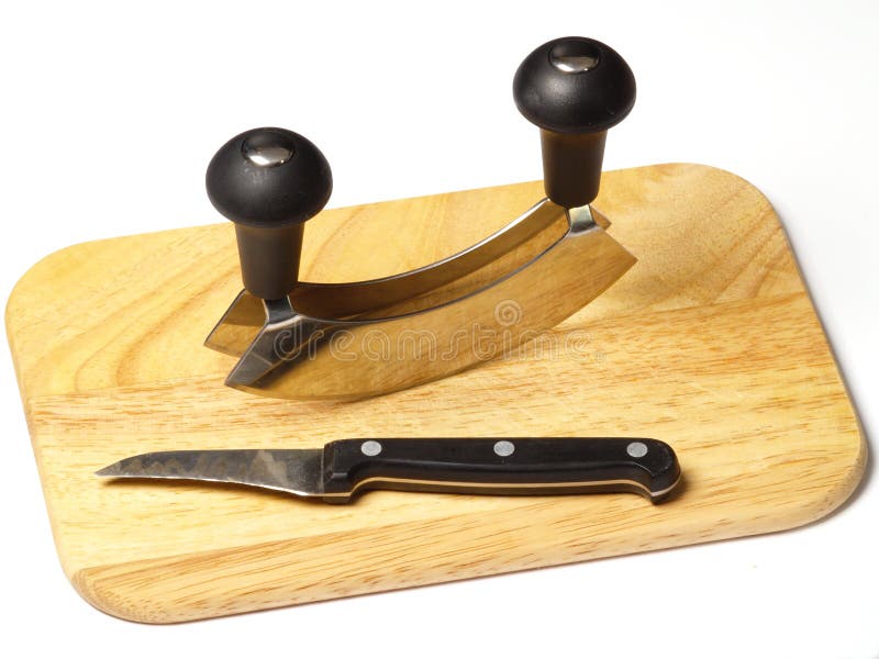 Mezzaluna stock photo. Image of cradle, board, food, chop - 12586642