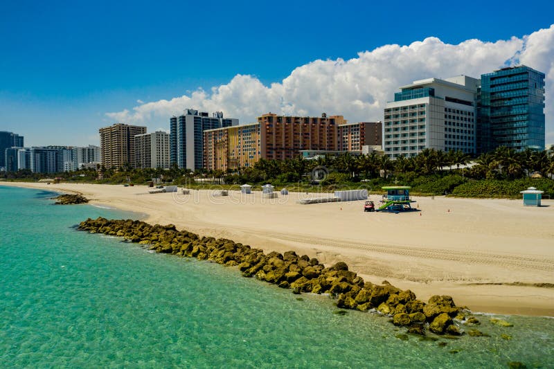 Miami Beach Coastal Scene with Rocks and Condominiums Stock Photo ...