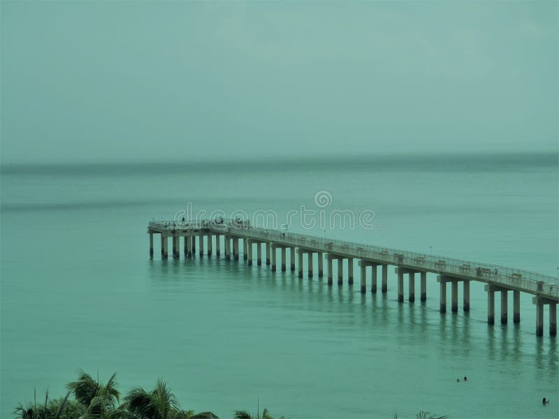 Miami Beach Pier Storms Rolling in Stock Image - Image of rain, storms ...