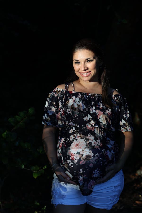 Hispanic Woman Maternity Photoshoot in a Park Stock Photo - Image of ... Hispanic Woman Maternity Photoshoot in a Park Stock Photo - Image of ...