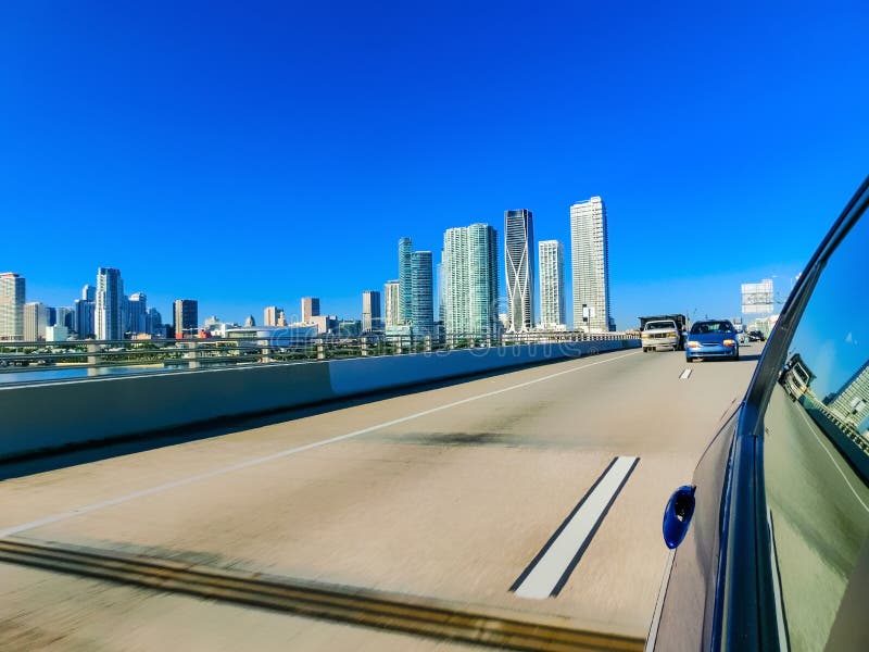 Miami Skyscrapers with Bridge Over Sea in the Day Stock Photo - Image ...