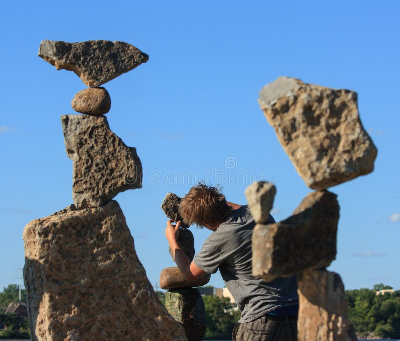 Michael Grab Balancing Stones at Festival Editorial Stock Image - Image ...