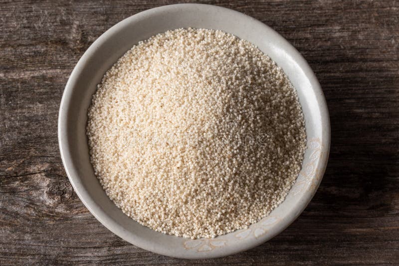 A Bowl of Raw Fonio Seeds with a Spoon Stock Image - Image of dietary ...