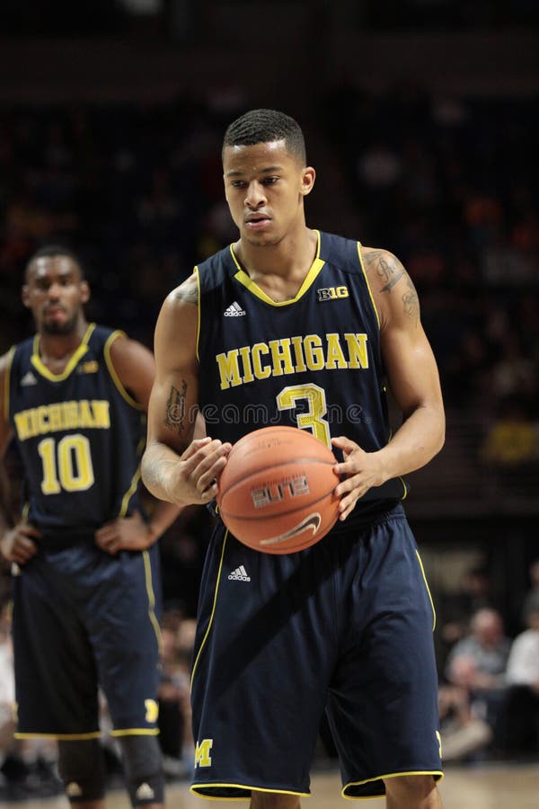 Michigan s #3 Trey Burke editorial photo. Image of defend - 32409721