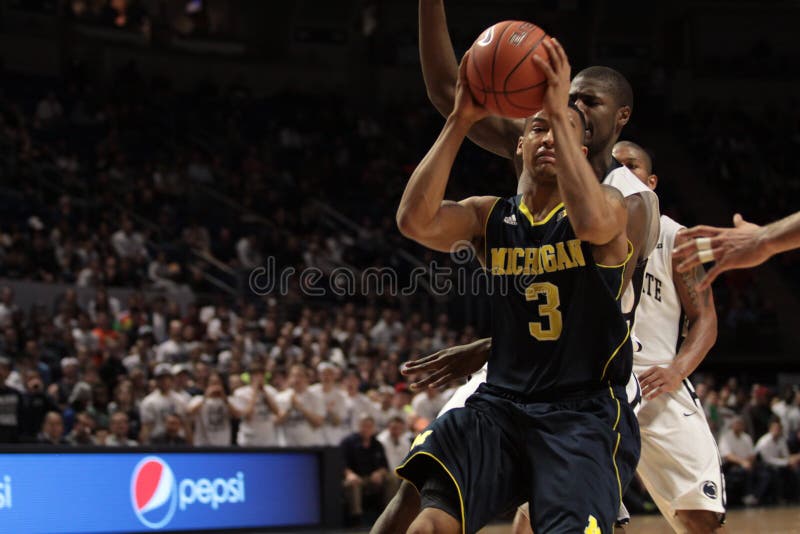 Michigan guard Trey Burke editorial photography. Image of lions - 29632037