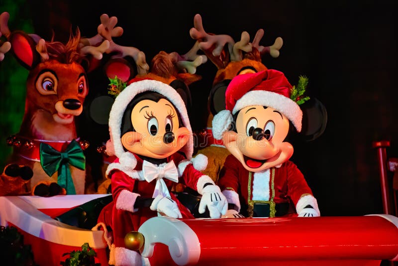 Mickey Y Minnie Mouse Como Sr. Y Sra. Claus Imagen de archivo editorial ...