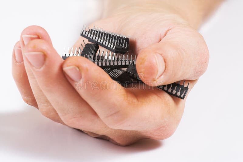 Micro chip in hand stock photo. Image of silicon, microchip - 1939824