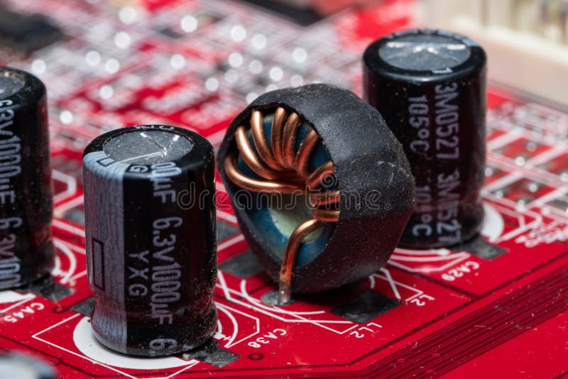 Micro Coil and Capacitors Mounted on Base Plate Stock Photo - Image of ...