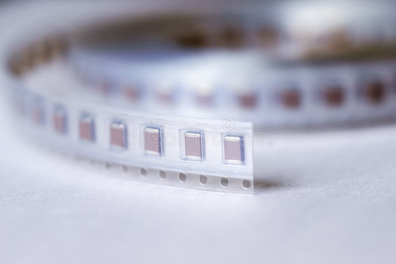 Micro Electronics Conceptual. Closeup of Tape with New SMD or Surface ...