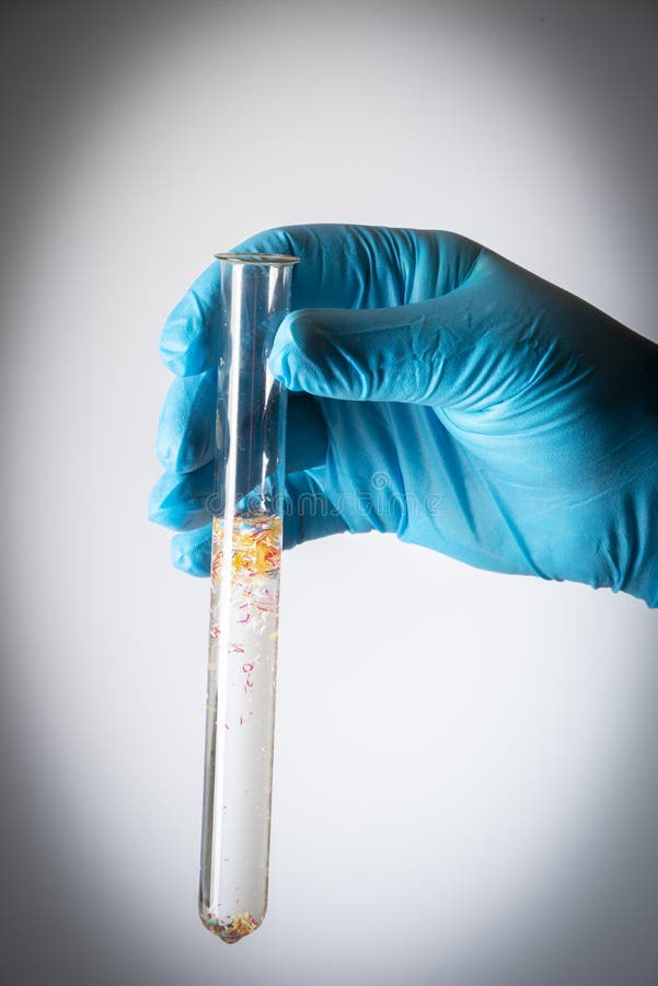 Micro Plastics in a Test Tube with Drinking Water Stock Image - Image ...