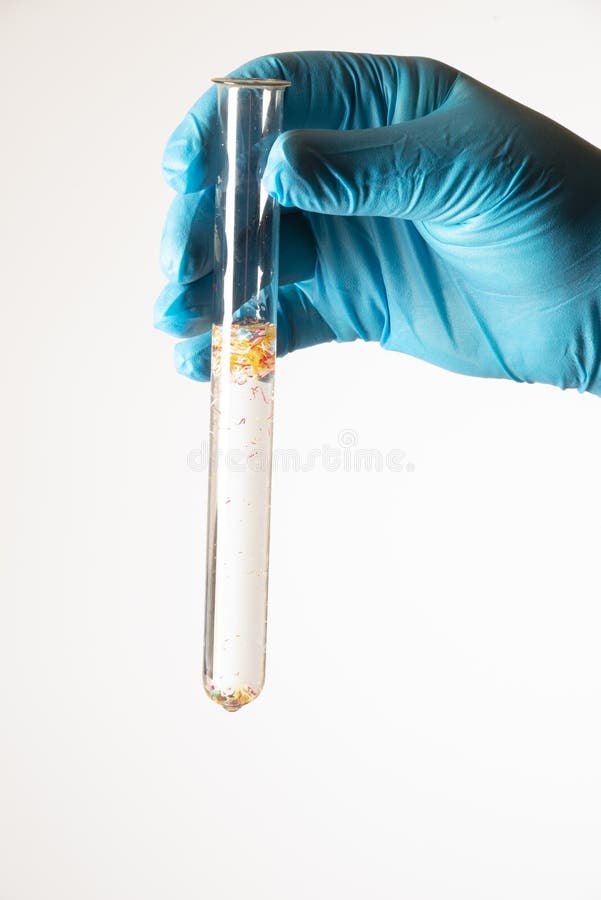 Micro Plastics in a Test Tube with Drinking Water Stock Image - Image ...