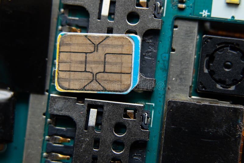 Micro Sim Card Inserted into the Slot of the Disassembled Phone Close ...