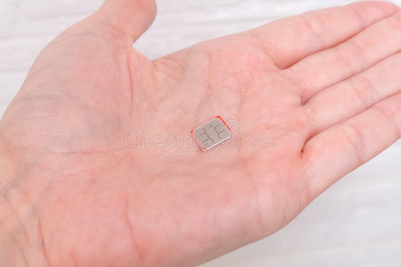 A Micro Sim Card on a Palm, Hand, Person Holding a Simcard Stock Image ...