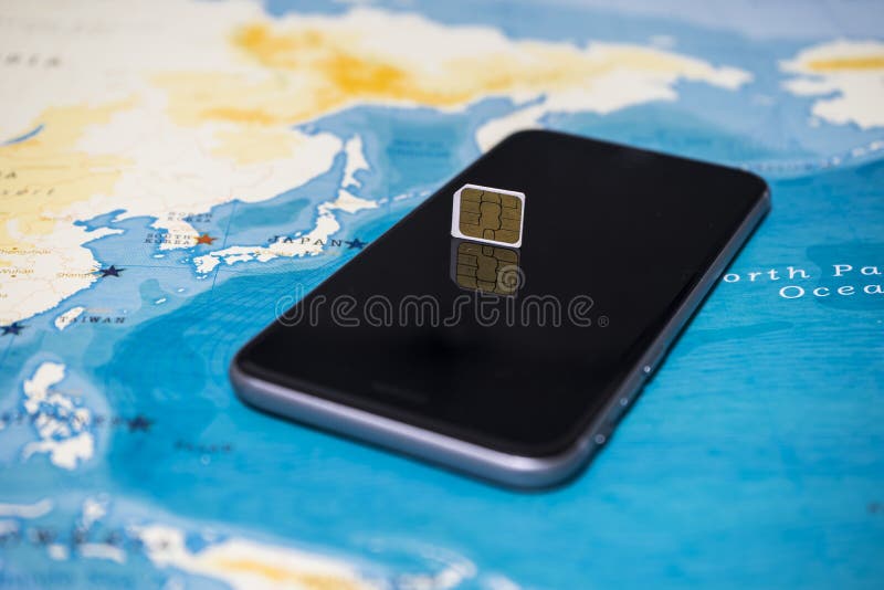 Micro SIM Card and Smartphone on the World Map Stock Photo - Image of ...