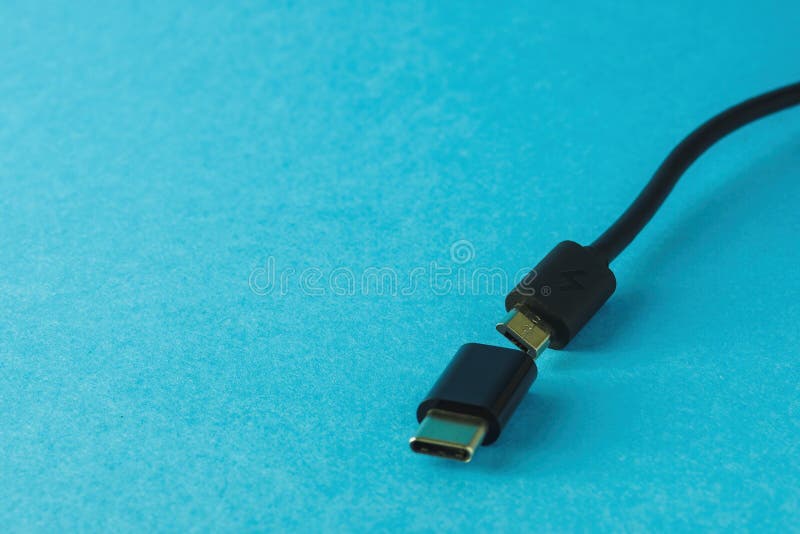 Micro USB To Type C Small Adapter and Cable on Blue Background Stock ...