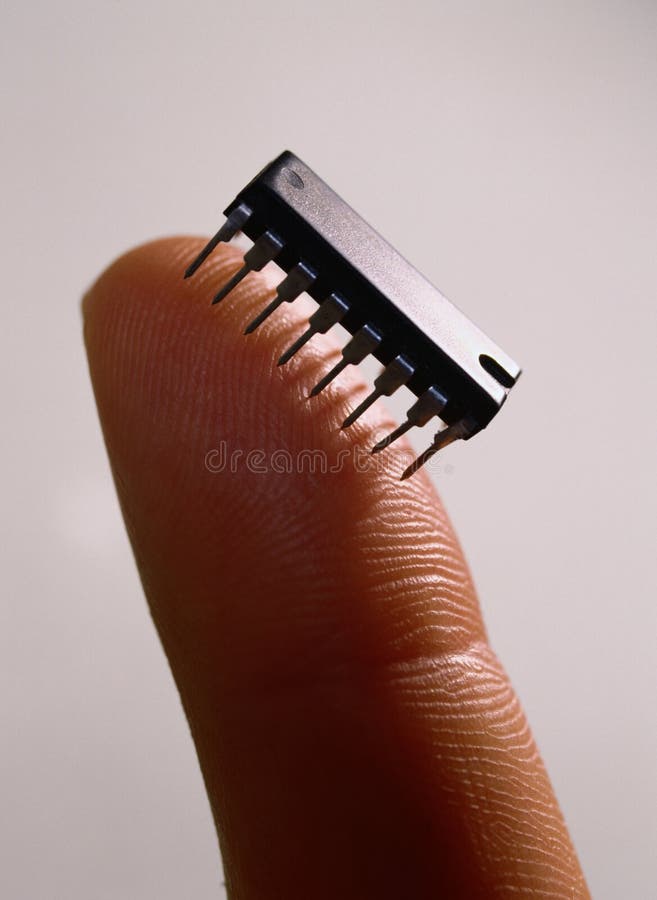 Microchip on finger stock image. Image of computers, finger - 4853373