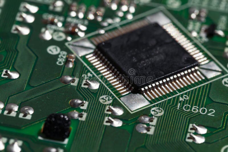 Microchip Mounted on a Green Printed Circuit Board Stock Photo - Image ...