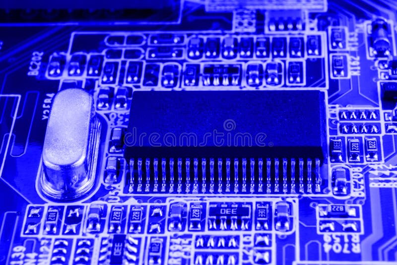 Microchip and Quartz on the Motherboard of a Modern Computer Blue ...