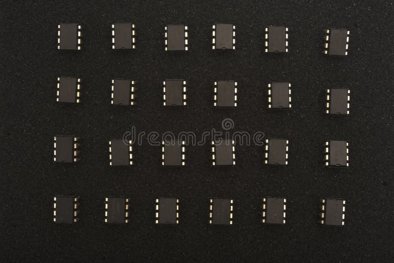 Microcircuits on Black Foam. Multiple Chips on a Substrate Stock Image ...