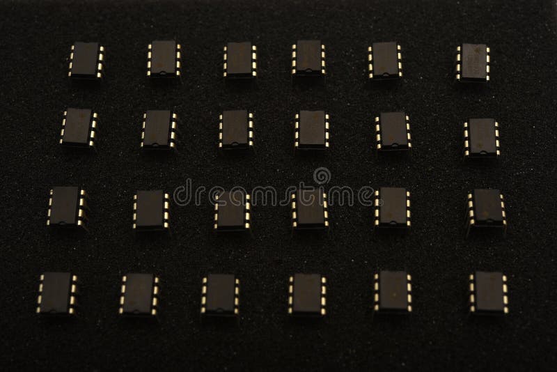 Microcircuits on Black Foam. Multiple Chips on a Substrate Stock Image ...