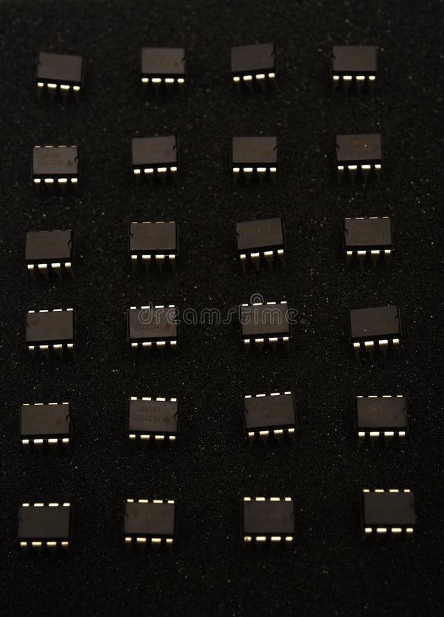 Microcircuits on Black Foam. Multiple Chips on a Substrate Stock Photo ...