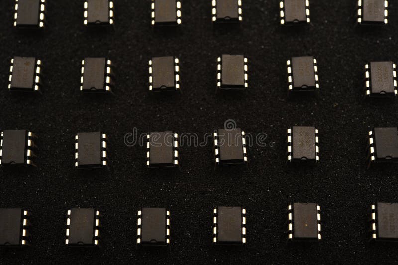 Microcircuits on Black Foam. Multiple Chips on a Substrate Stock Photo ...