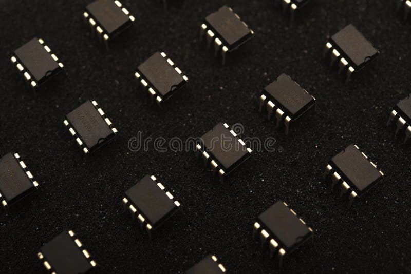 Microcircuits on Black Foam. Multiple Chips on a Substrate Stock Photo ...