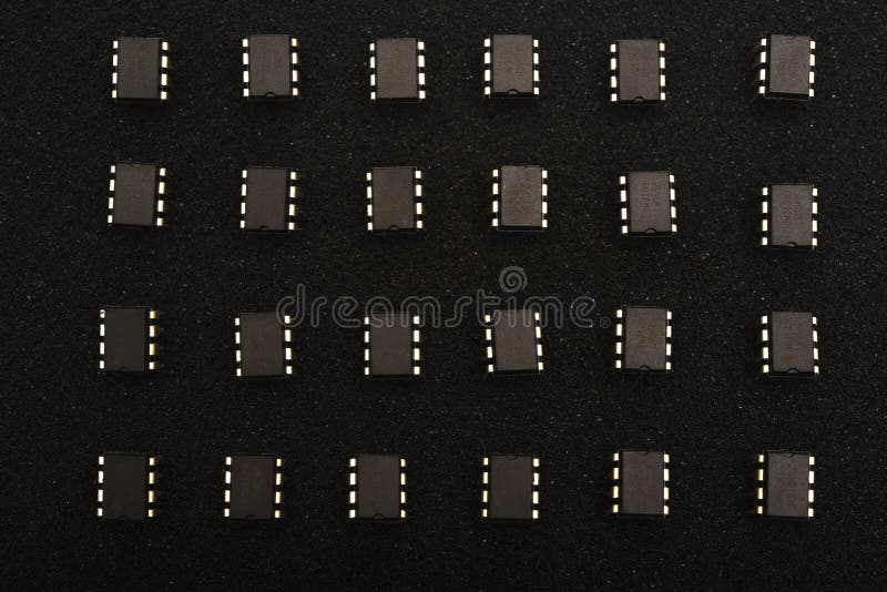 Microcircuits on Black Foam. Multiple Chips on a Substrate Stock Photo ...