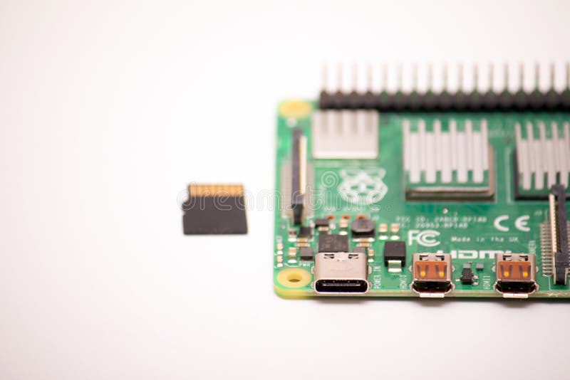 Microcomputer Raspberry Pi 4 with a Microsd Card Lying Next To it ...