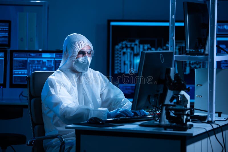 Microelectronics Engineer Works in a Modern Scientific Laboratory on ...