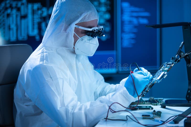 Microelectronics Engineer Works in a Modern Scientific Laboratory on ...