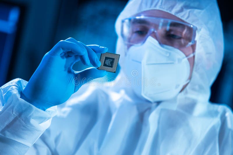 Microelectronics Engineer Works in a Modern Scientific Laboratory on ...