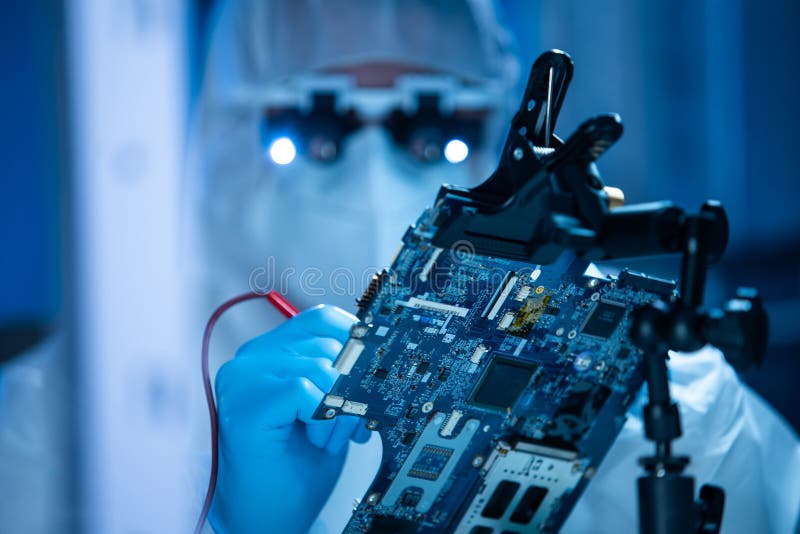 Microelectronics Engineer Works in a Modern Scientific Laboratory on ...