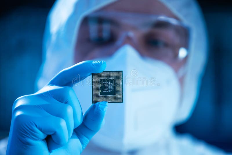 Microelectronics Engineer Works in a Modern Scientific Laboratory on ...