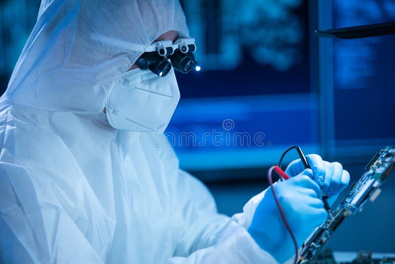 Microelectronics Engineer Works in a Modern Scientific Laboratory on ...