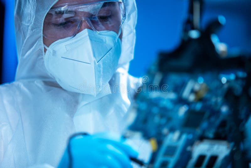 Microelectronics Engineer Works in a Modern Scientific Laboratory on ...