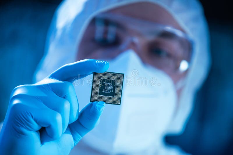 Microelectronics Engineer Works in a Modern Scientific Laboratory on ...