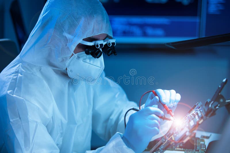 Microelectronics Engineer Works in a Modern Scientific Laboratory on ...